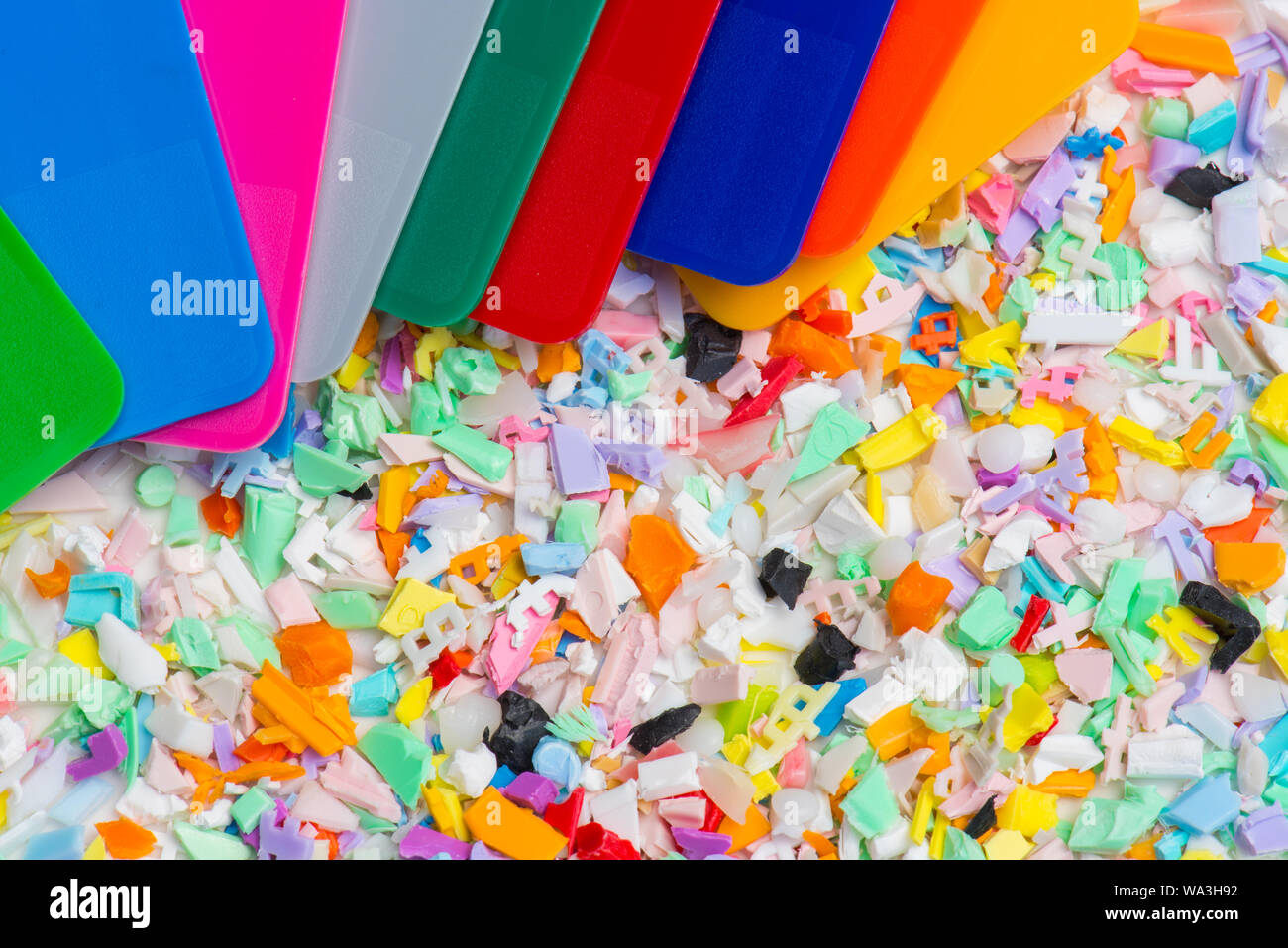 coloured plastic regrind in lab Stock Photo - Alamy
