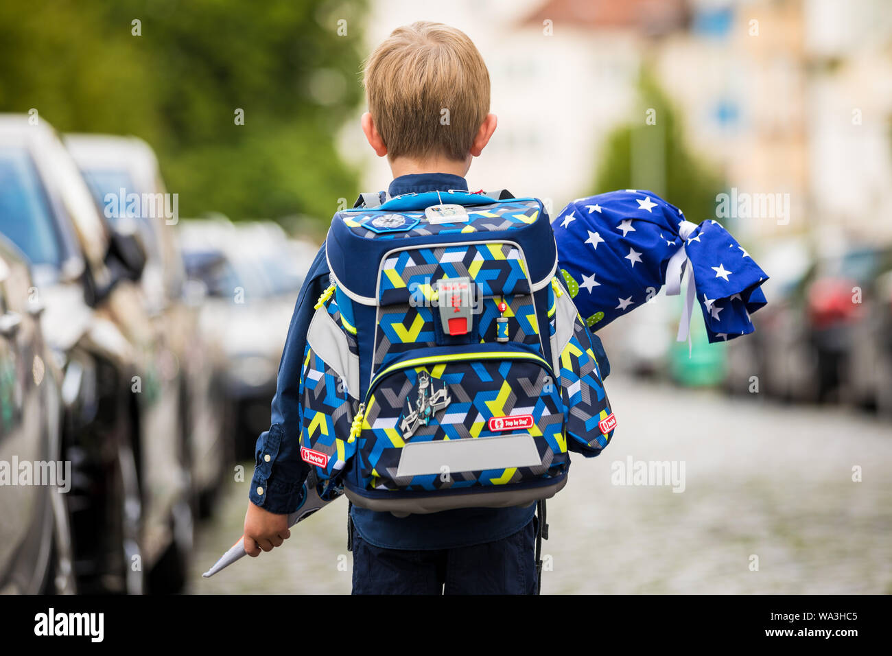 Hanover, Germany. 17th Aug, 2019. A first-year pupil stands in front of ...