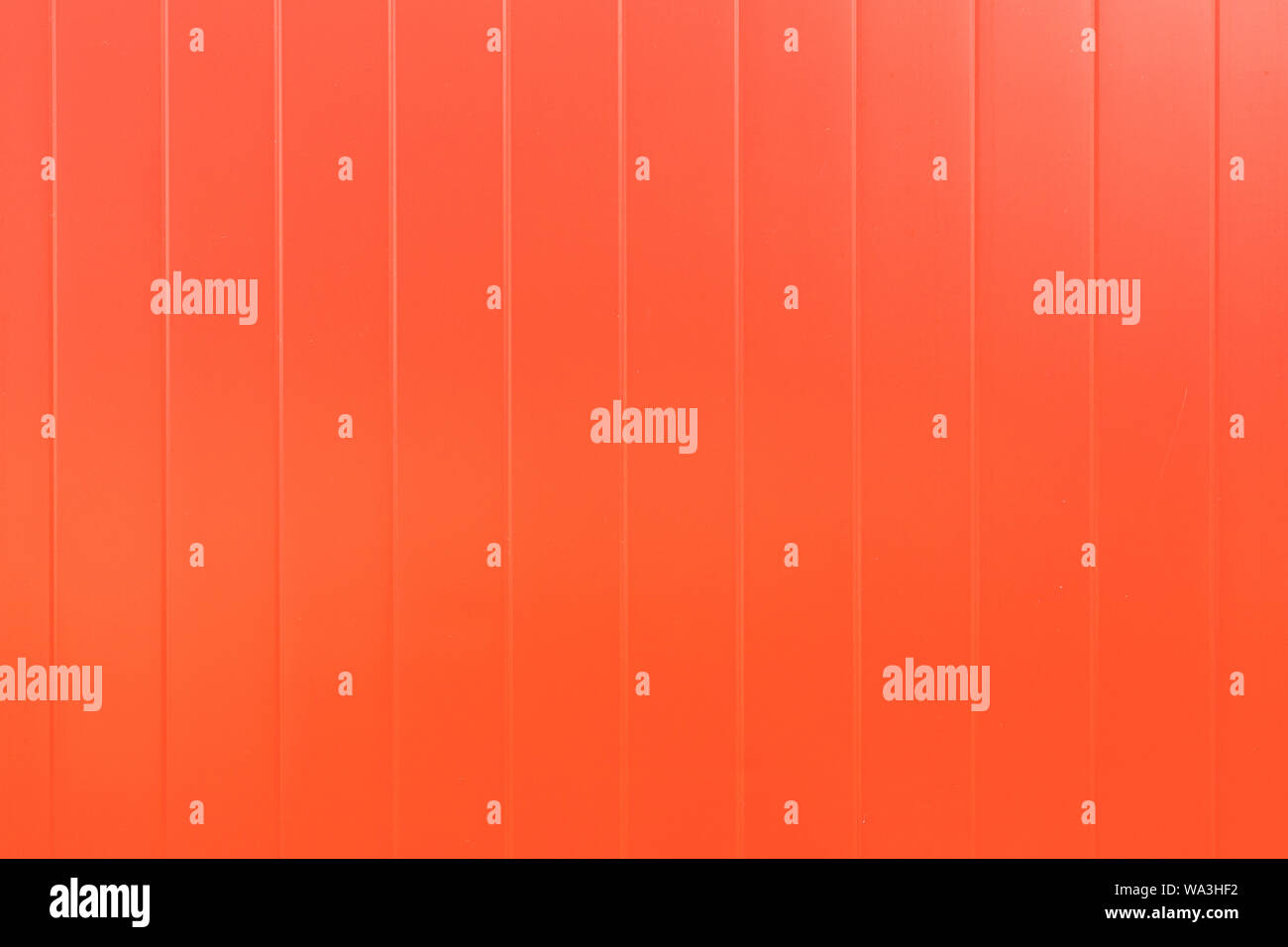 Red metal covered wall, color texture background Stock Photo - Alamy