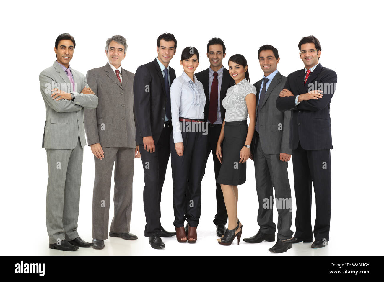 Business executives standing together and smiling Stock Photo - Alamy