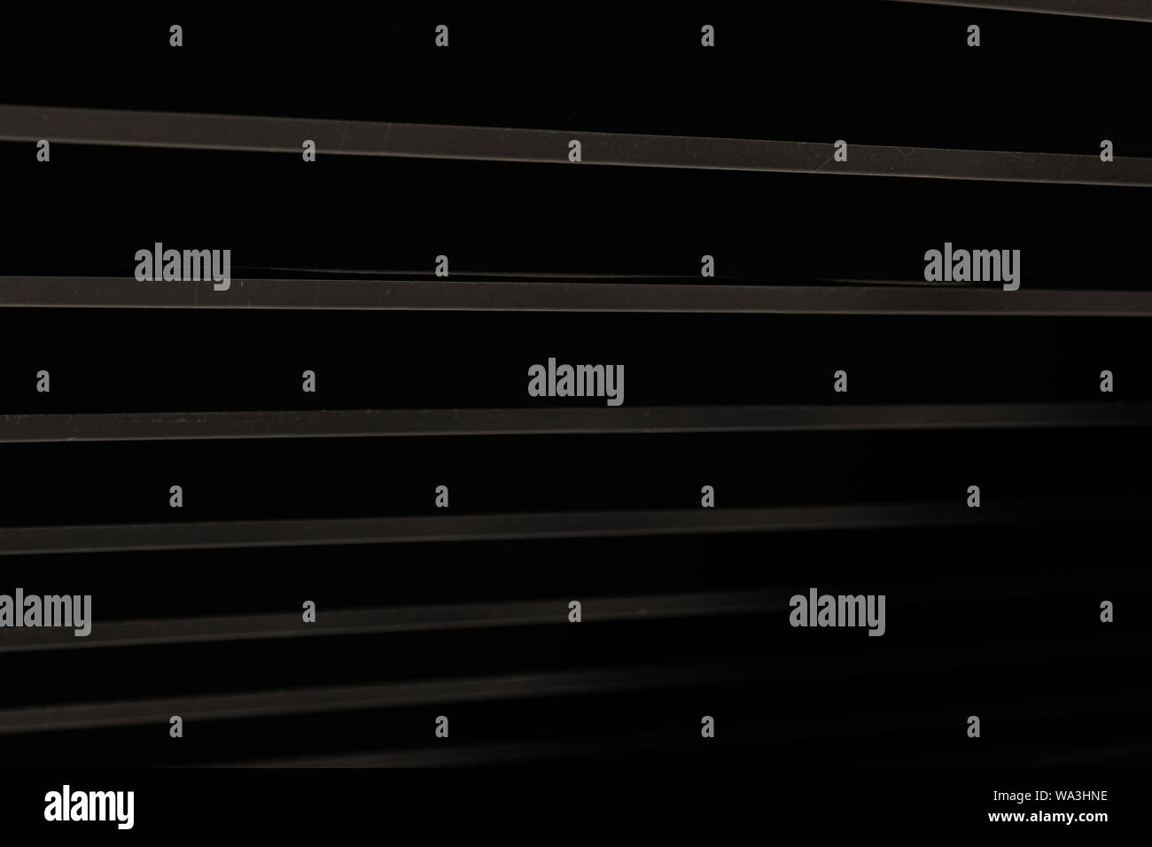 Close-up of black corrugated surface fading on the right side Stock ...