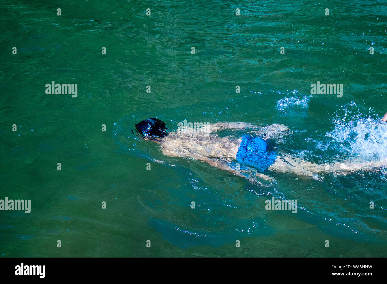 Young boy drowning in to the water, failure and rescue concept Stock ...