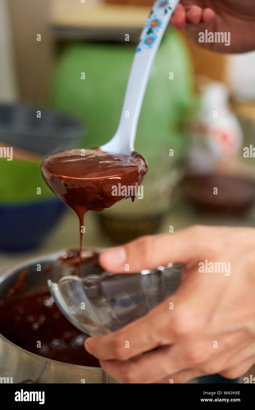 Hands of chef making pudding Stock Photo - Alamy