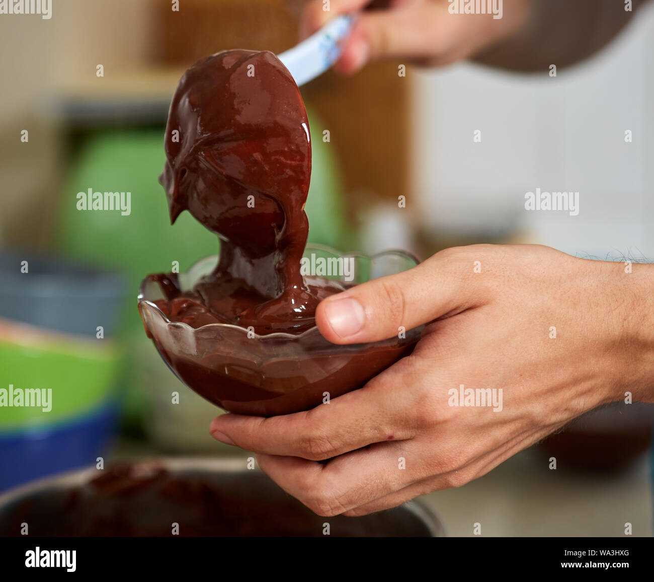 Hands of chef making pudding Stock Photo - Alamy