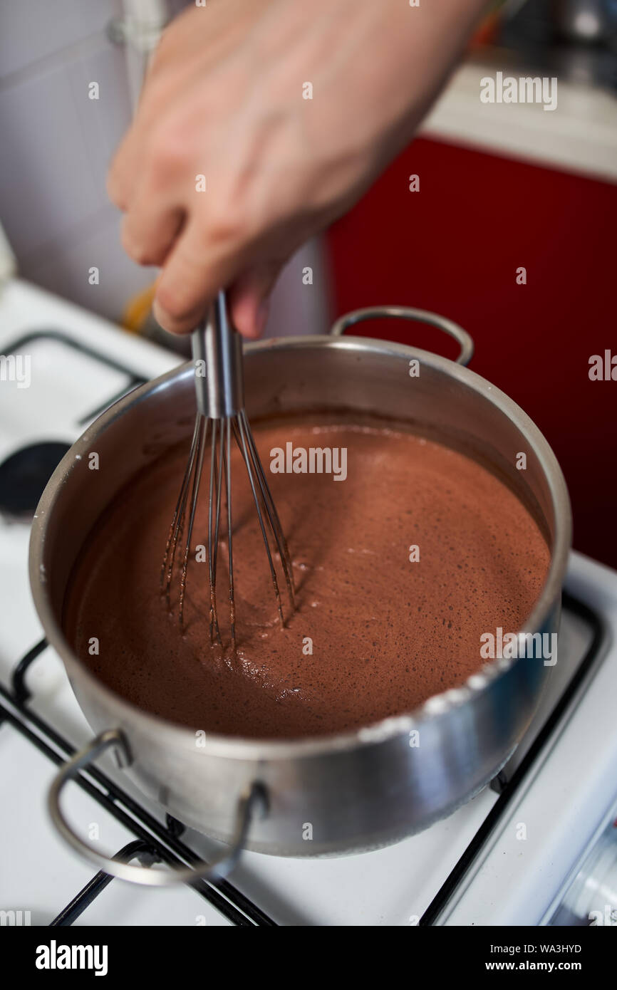Hands of chef making pudding Stock Photo - Alamy