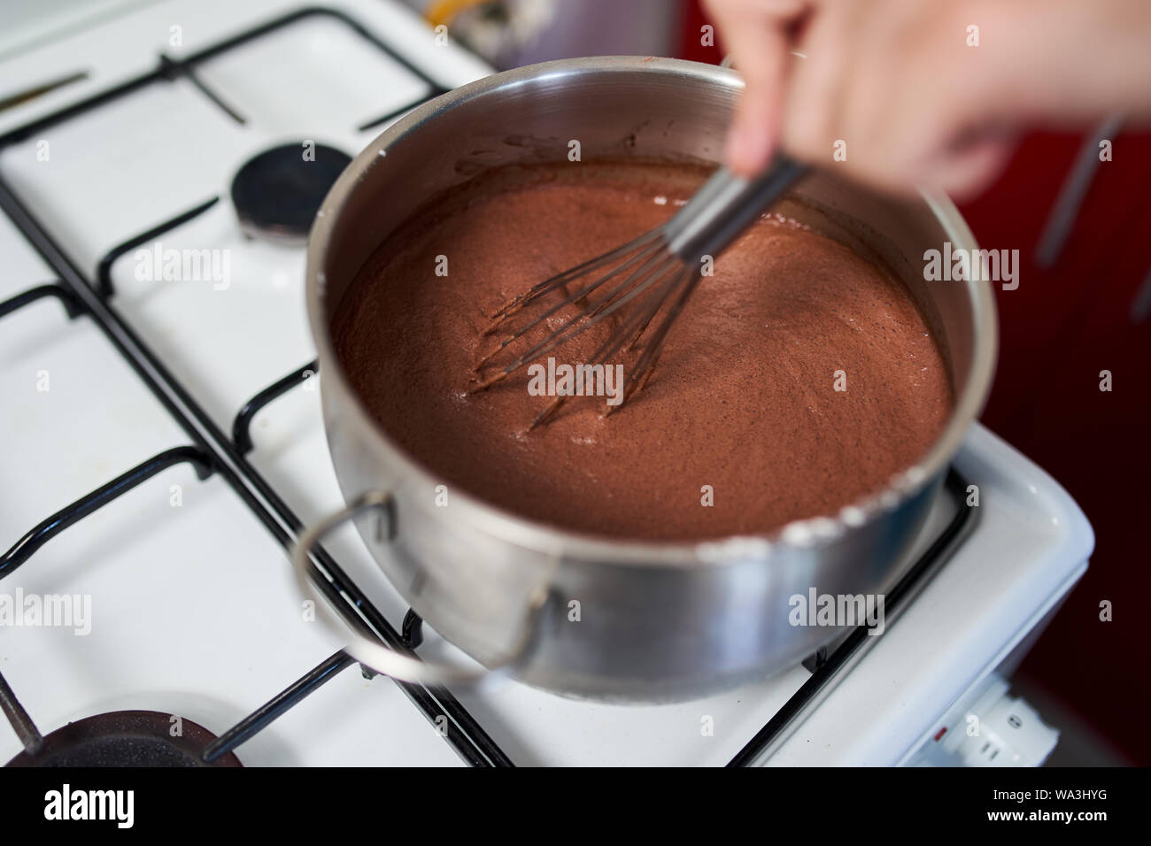 Hands of chef making pudding Stock Photo - Alamy