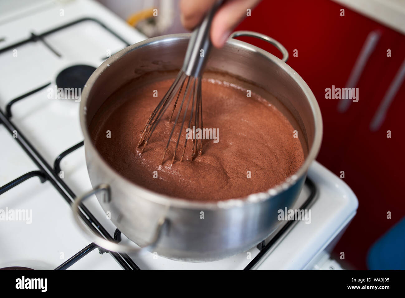Hands of chef making pudding Stock Photo - Alamy