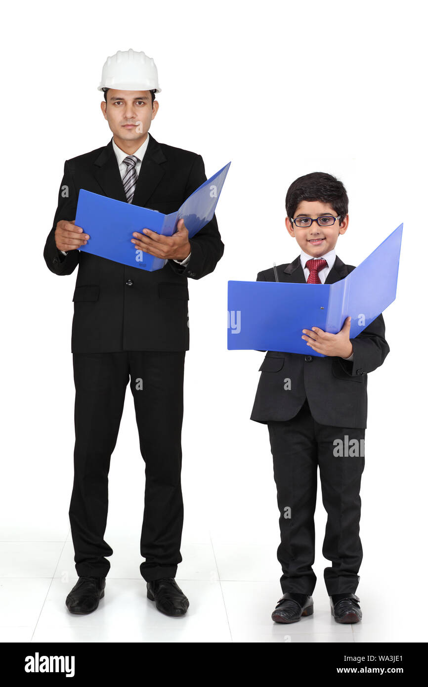 Child imitating father Cut Out Stock Images & Pictures - Alamy