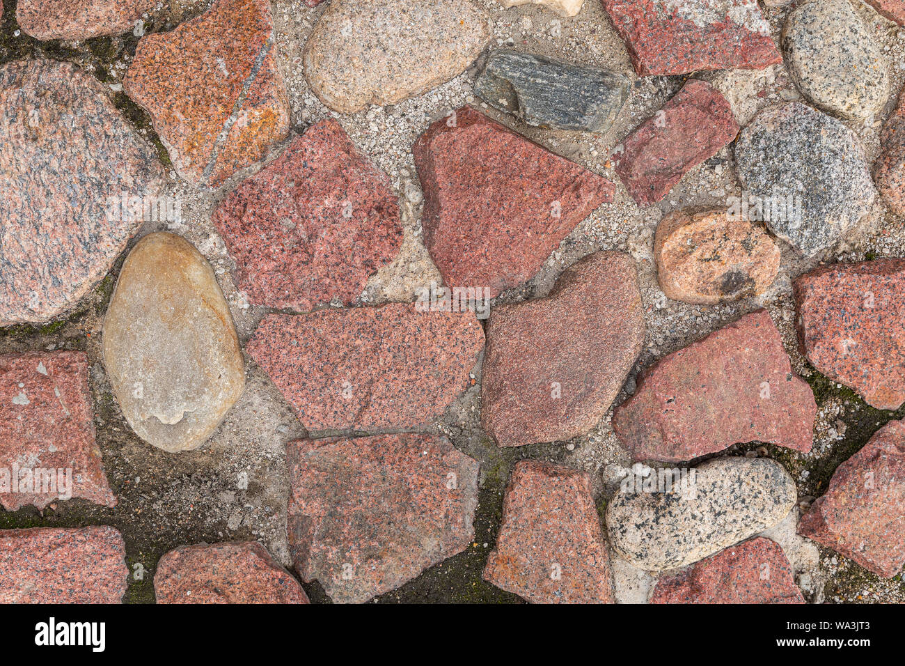 Mostly red granite stones pavement, pattern seamless, texture Stock ...