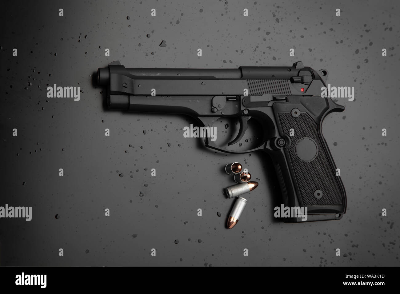Modern black gun on a dark background. Pistol Stock Photo - Alamy
