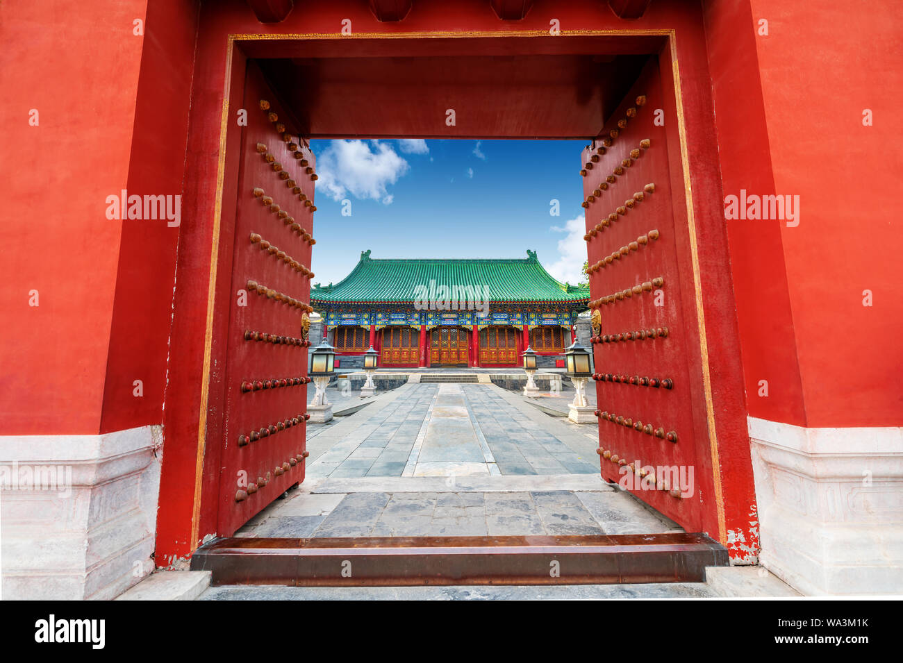 Red gates and historic buildings, Beijing, China Stock Photo - Alamy