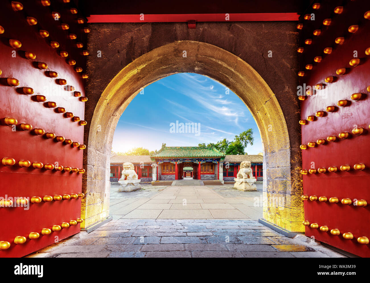 Red gates and historic buildings, Beijing, China.Translation: "Prince ...