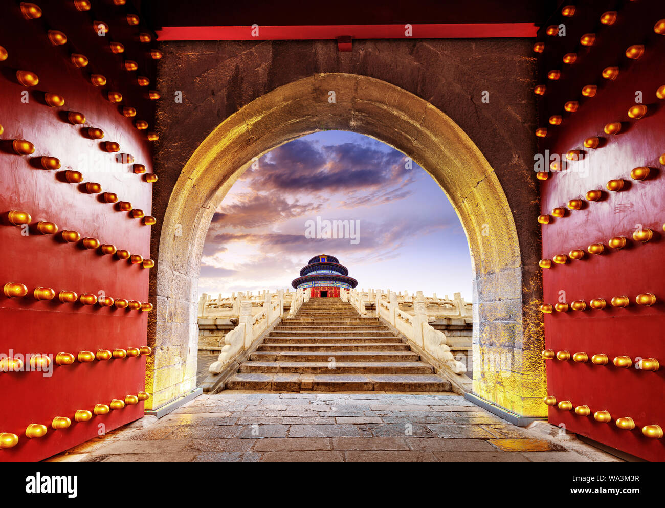 Red gates and historic buildings, Beijing, China.Translation:"Hall of ...