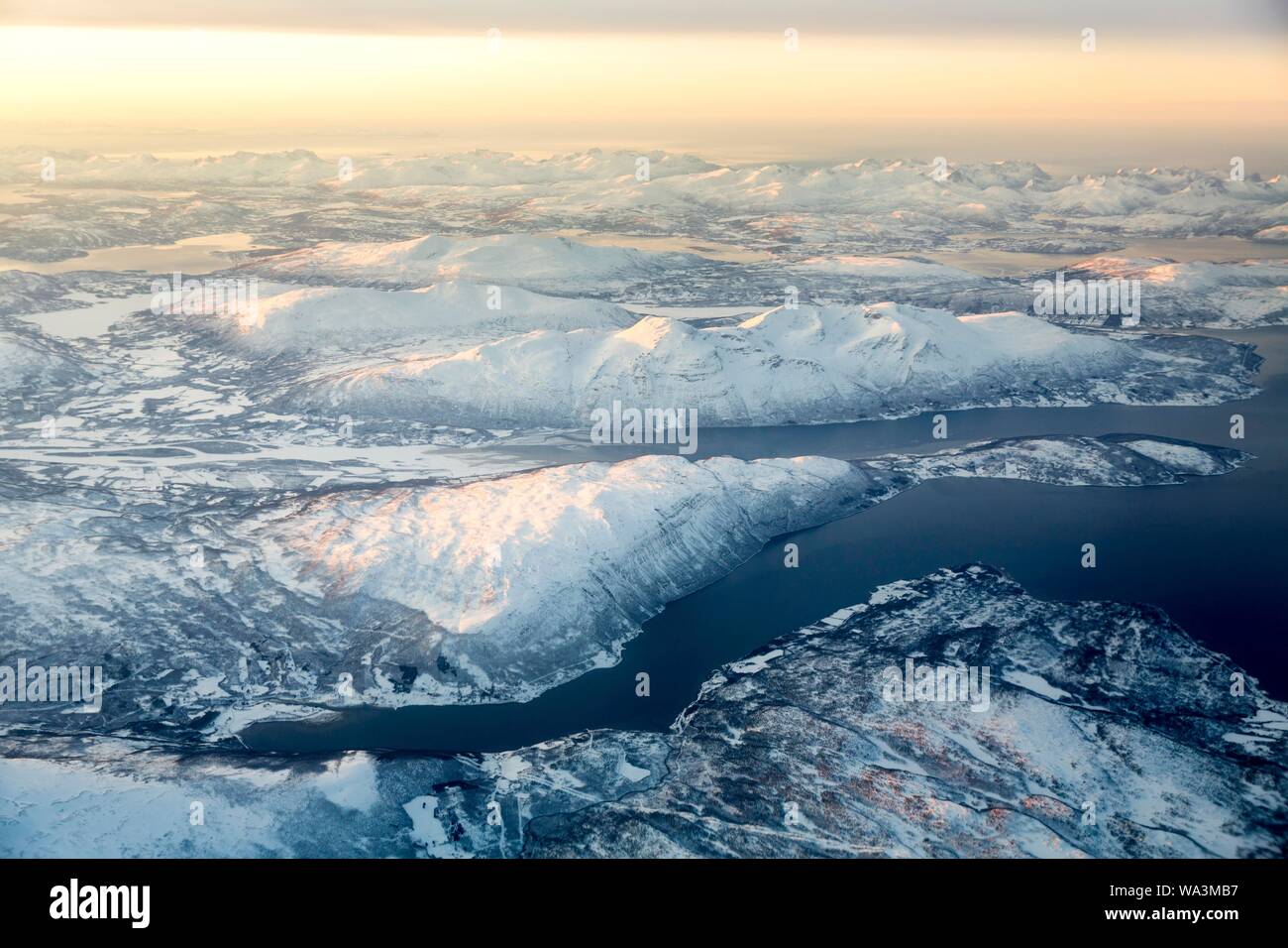 Overview with the fjord and snow covered mountains photo hi-res stock ...