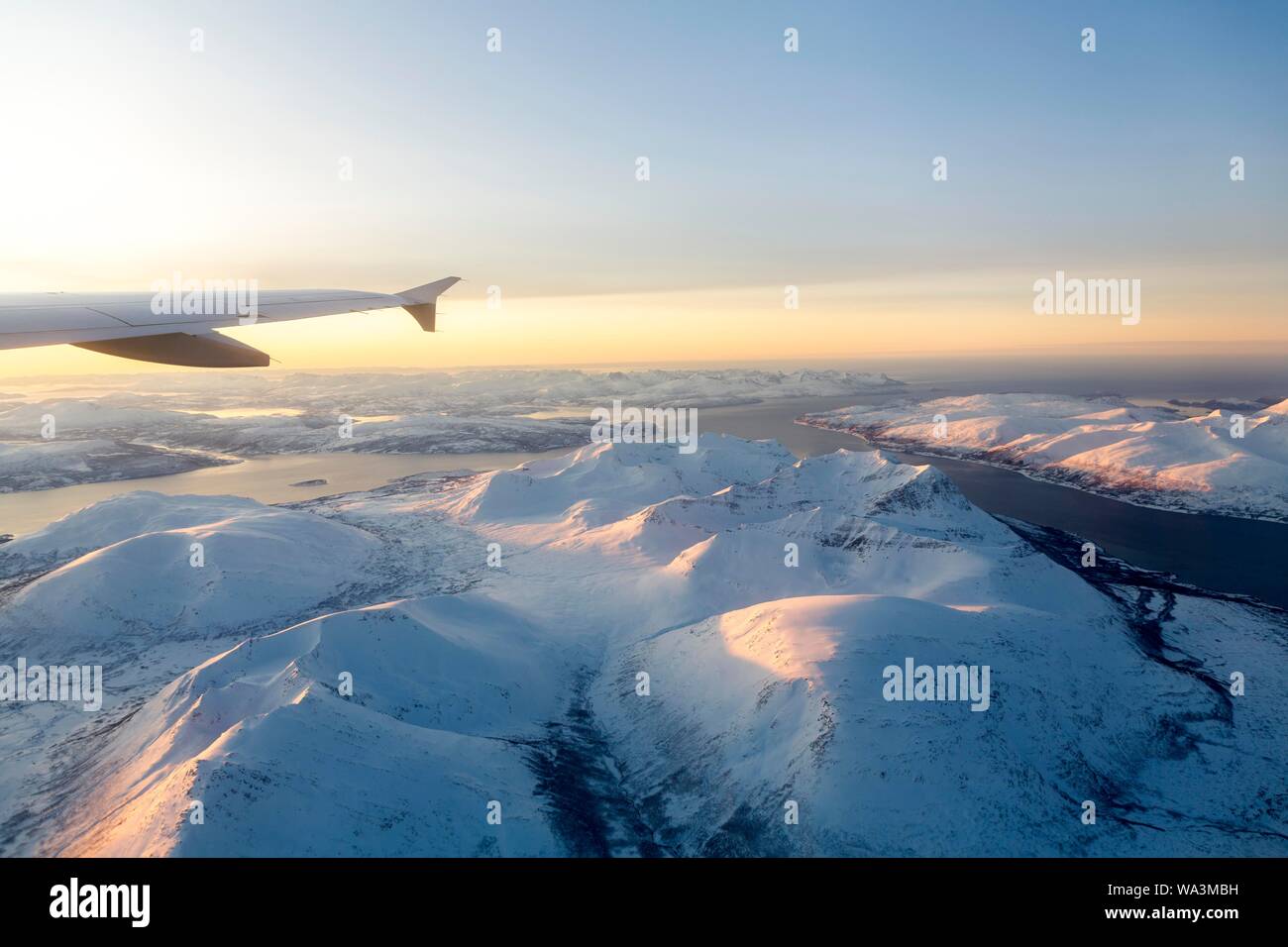 Aerial view, snow-covered mountains with fjord, province Tromso, Tromso ...