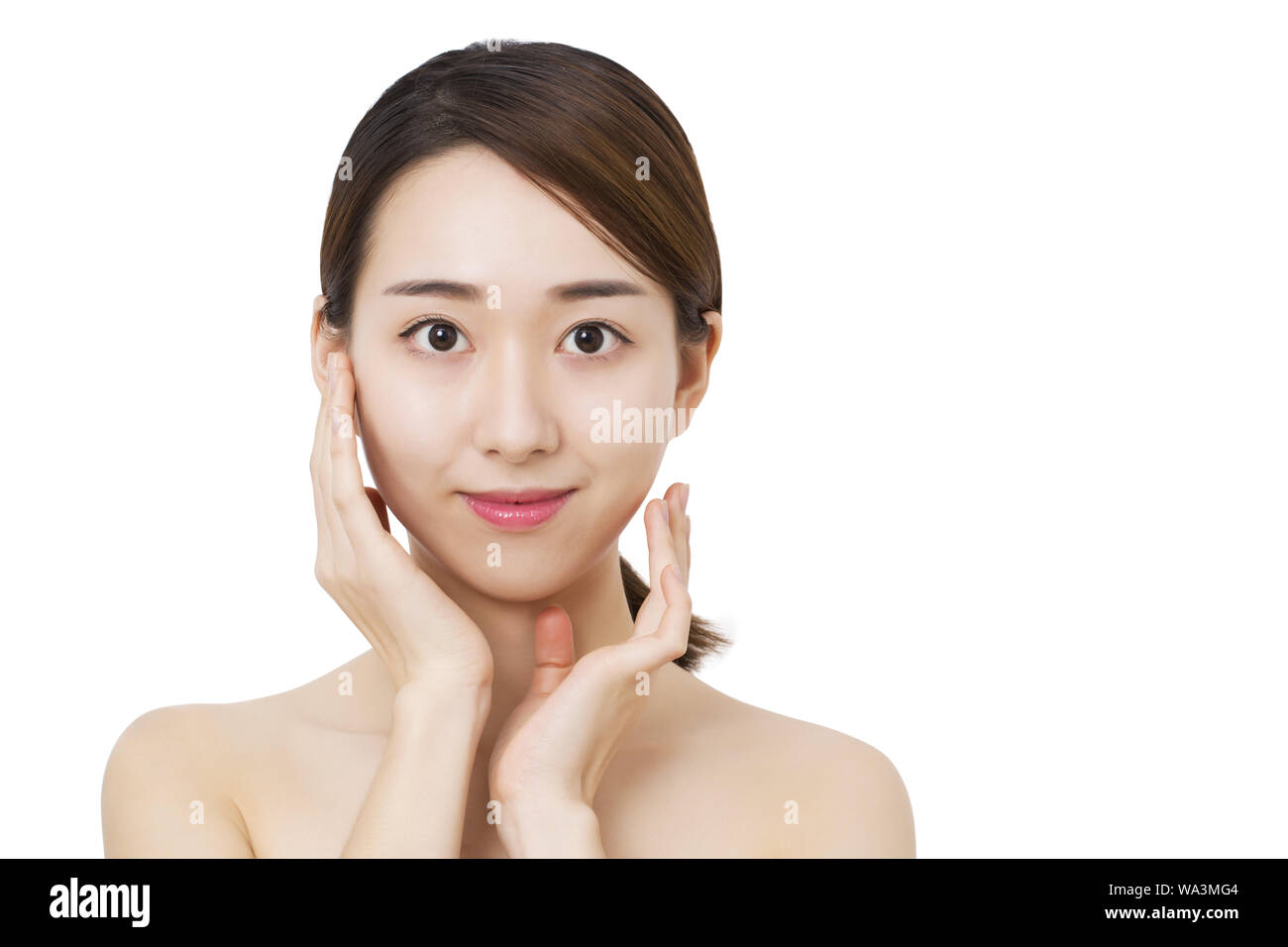 Beautiful woman touch her face Stock Photo - Alamy