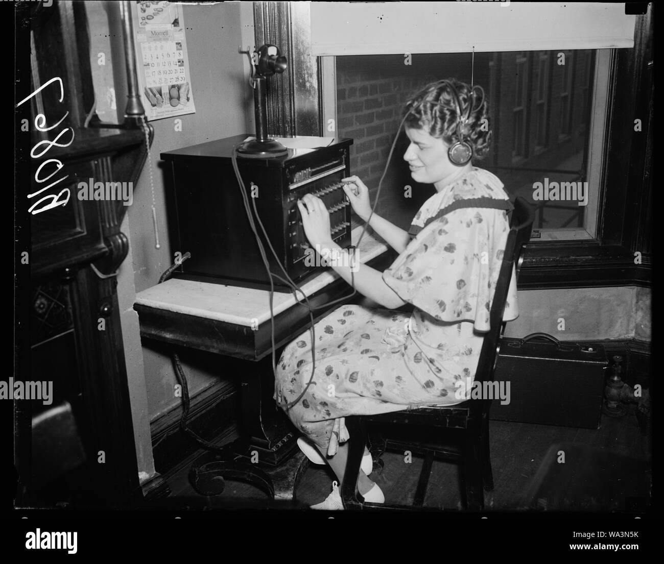 Blind telephone operator, Miss Bernice Christie Stock Photo - Alamy