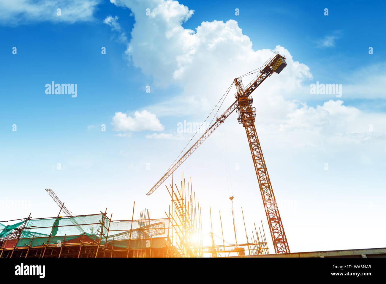 Building construction site, tall skyscrapers and cranes Stock Photo - Alamy