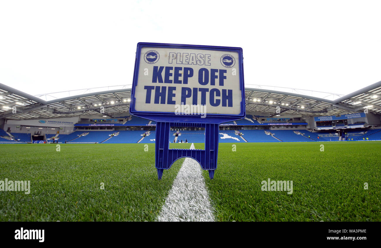 A please keep off the grass sign on the pitch ahead of the Premier ...