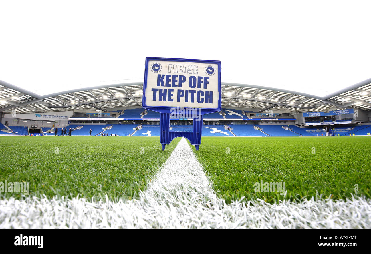 A please keep off the grass sign on the pitch ahead of the Premier ...