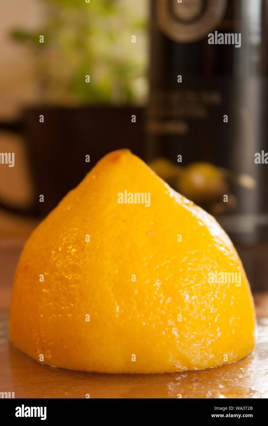 Vertical closeup of a lemon sliced in half Stock Photo - Alamy