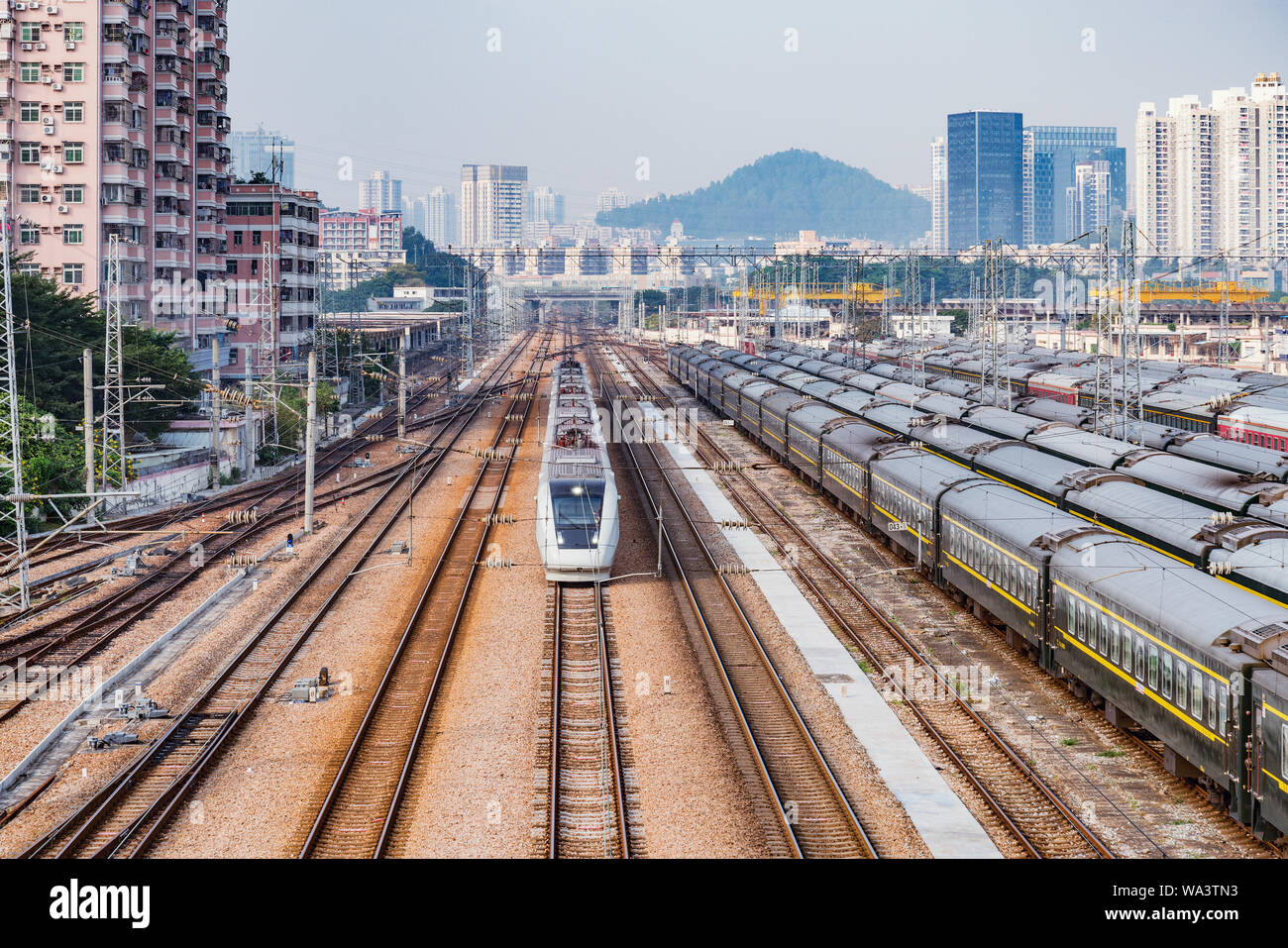 Highspeed train approaches to the station. Shenzhen. China Stock Photo ...