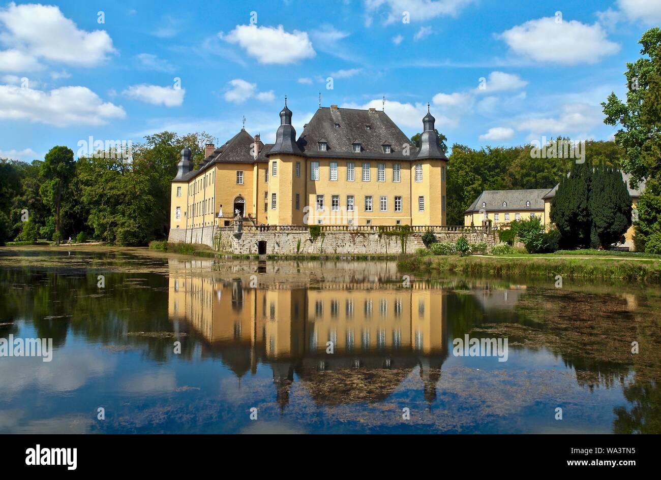 Romantic yellow water castle Schloss Dyck in Juechen in Germany Stock ...