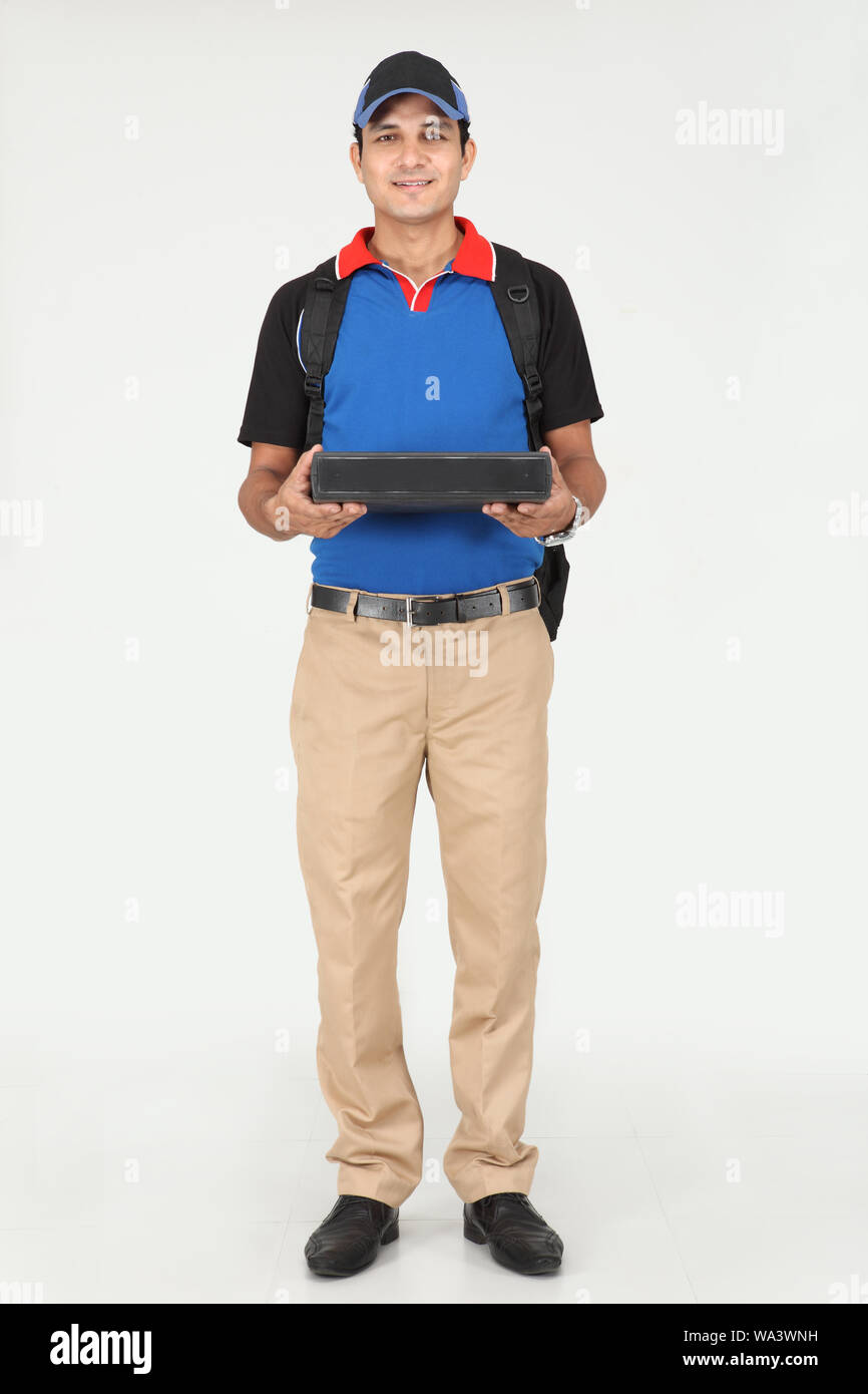 Pizza delivery boy Stock Photo - Alamy