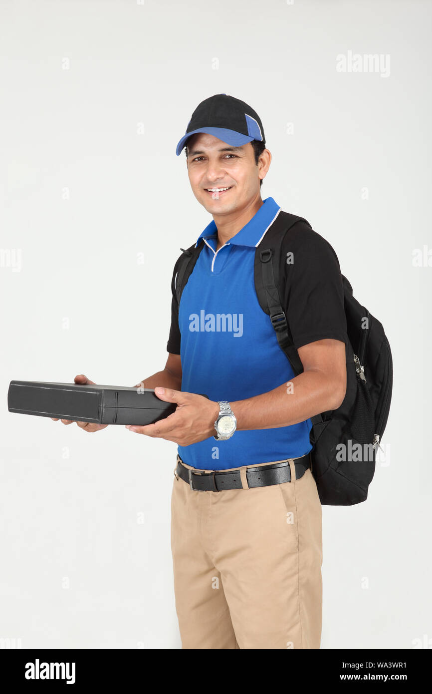 Pizza delivery boy Stock Photo - Alamy