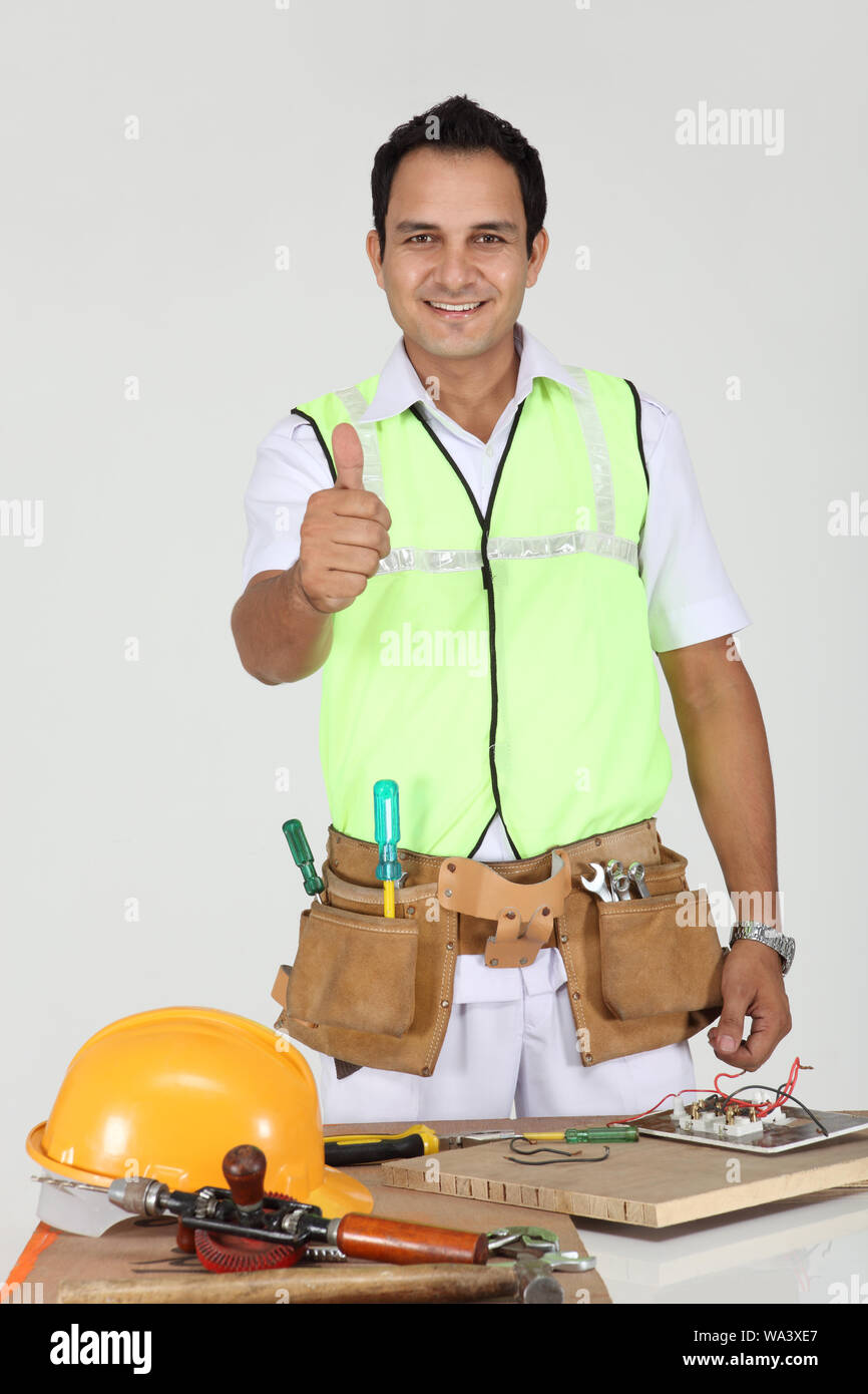 Young engineer showing thumbs up hi-res stock photography and images ...