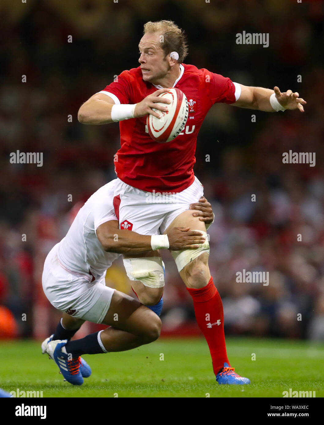 Wales' Alun Wyn Jones (right) and England's Anthony Watson battle for ...