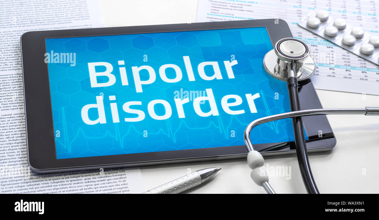 The word Bipolar disorder on the display of a tablet Stock Photo - Alamy