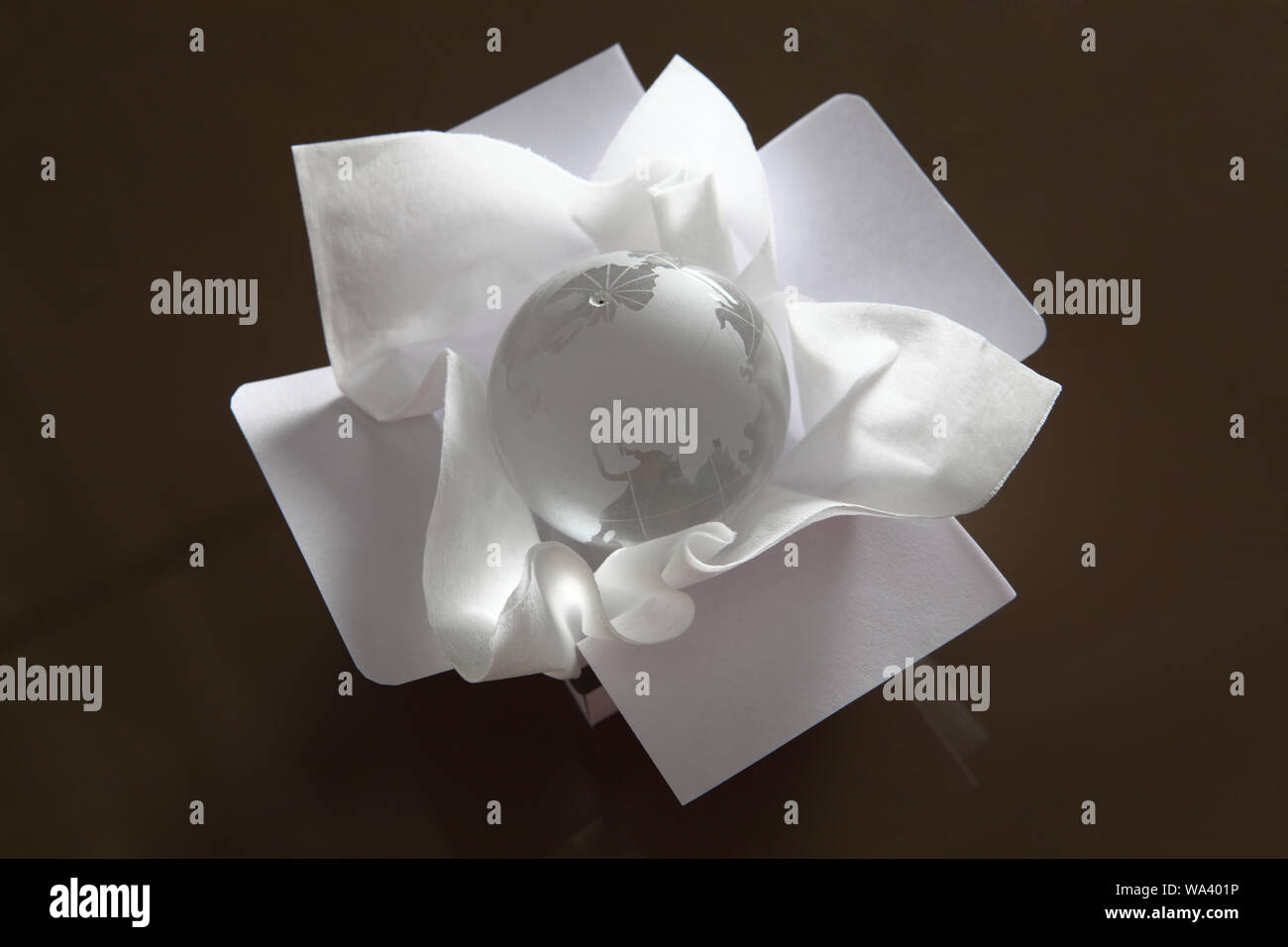 Close up of globe in a gift box Stock Photo - Alamy