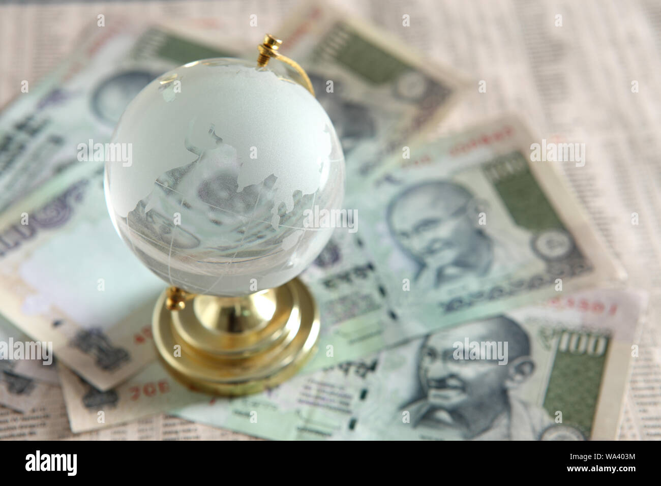 Money world notes globe hi-res stock photography and images - Alamy