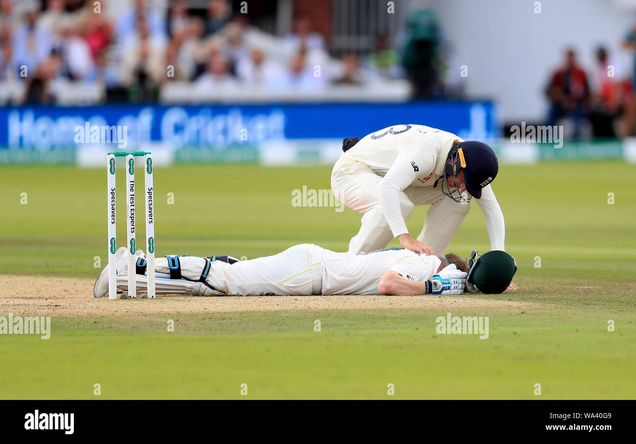 Australia's Steve Smith ends up on the floor after being hit by the ...