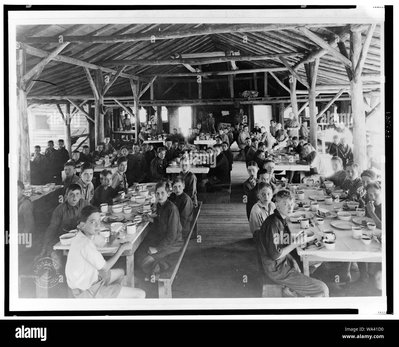 Boy Scouts eating in mess hall at Camp Ranachqua Stock Photo - Alamy