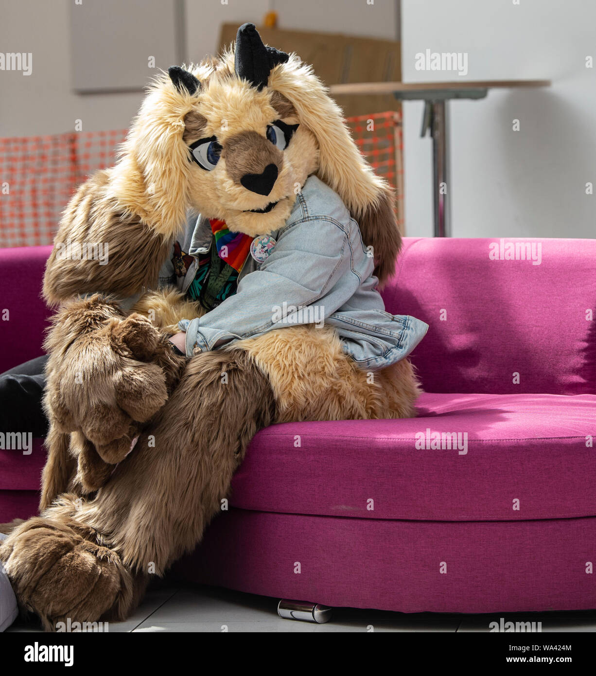 Berlin, Germany. 17th Aug, 2019. A participant of the "Eurofurence" is ...