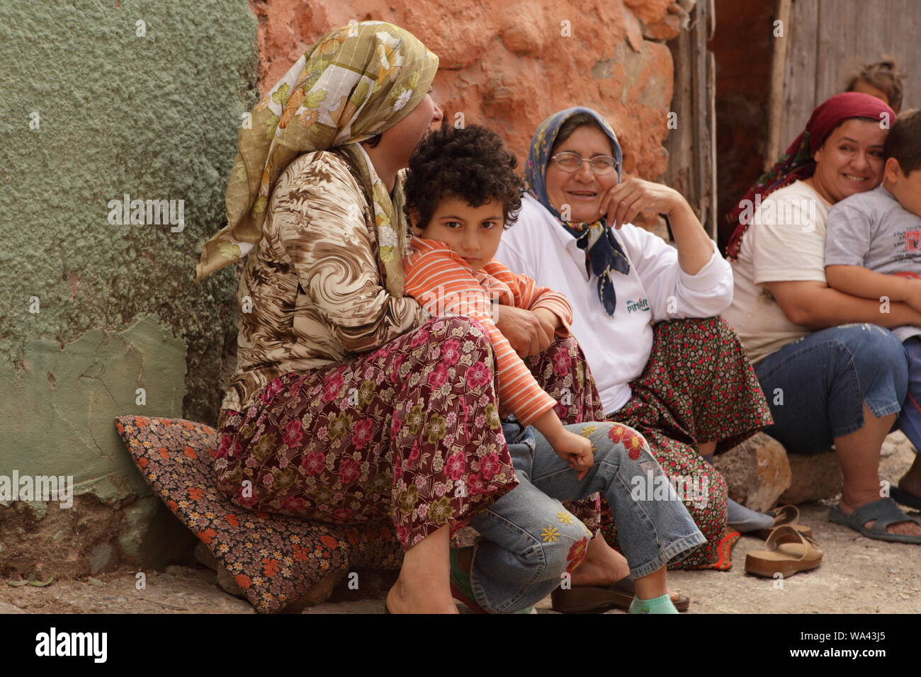 family in Turkish Aegean sea town Stock Photo - Alamy