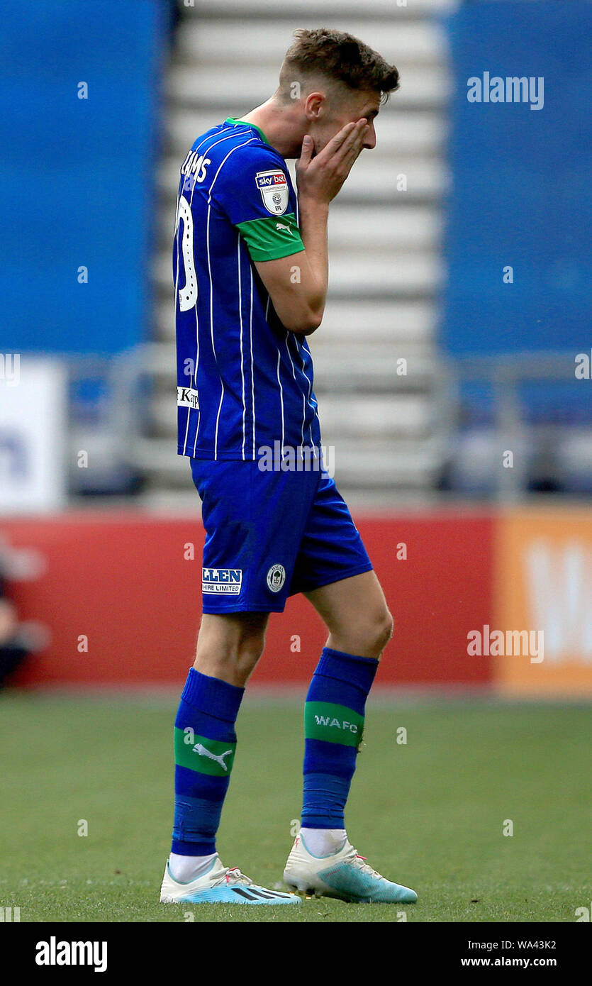 Wigan Athletic's Joe Williams leaves the field after referee Andrew ...