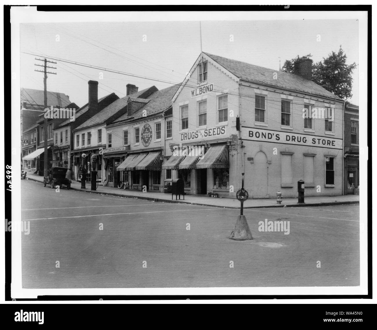 Buildings in main street Cut Out Stock Images & Pictures - Alamy