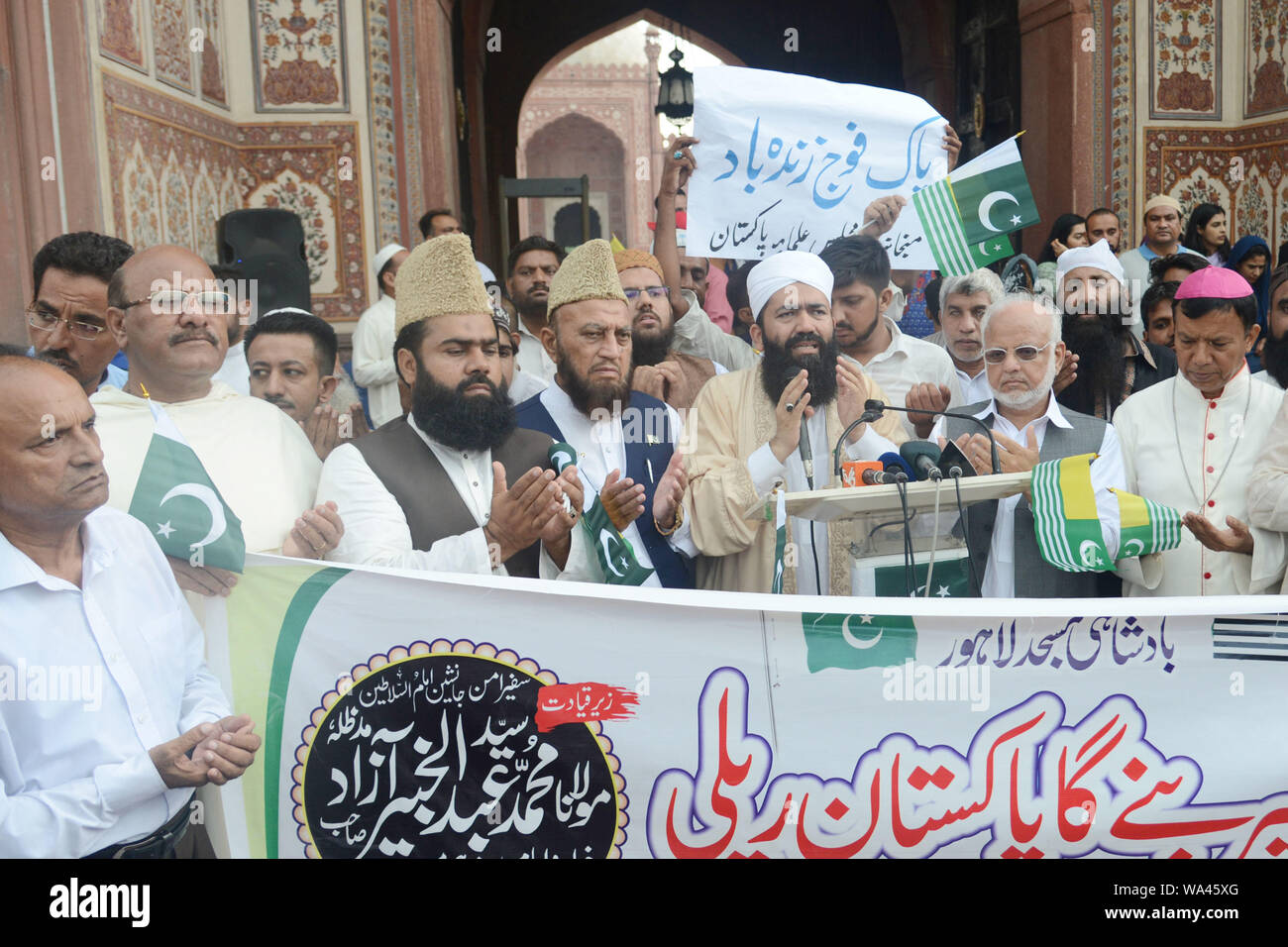 People Holding Pakistan Flag In Rally High Resolution Stock Photography ...