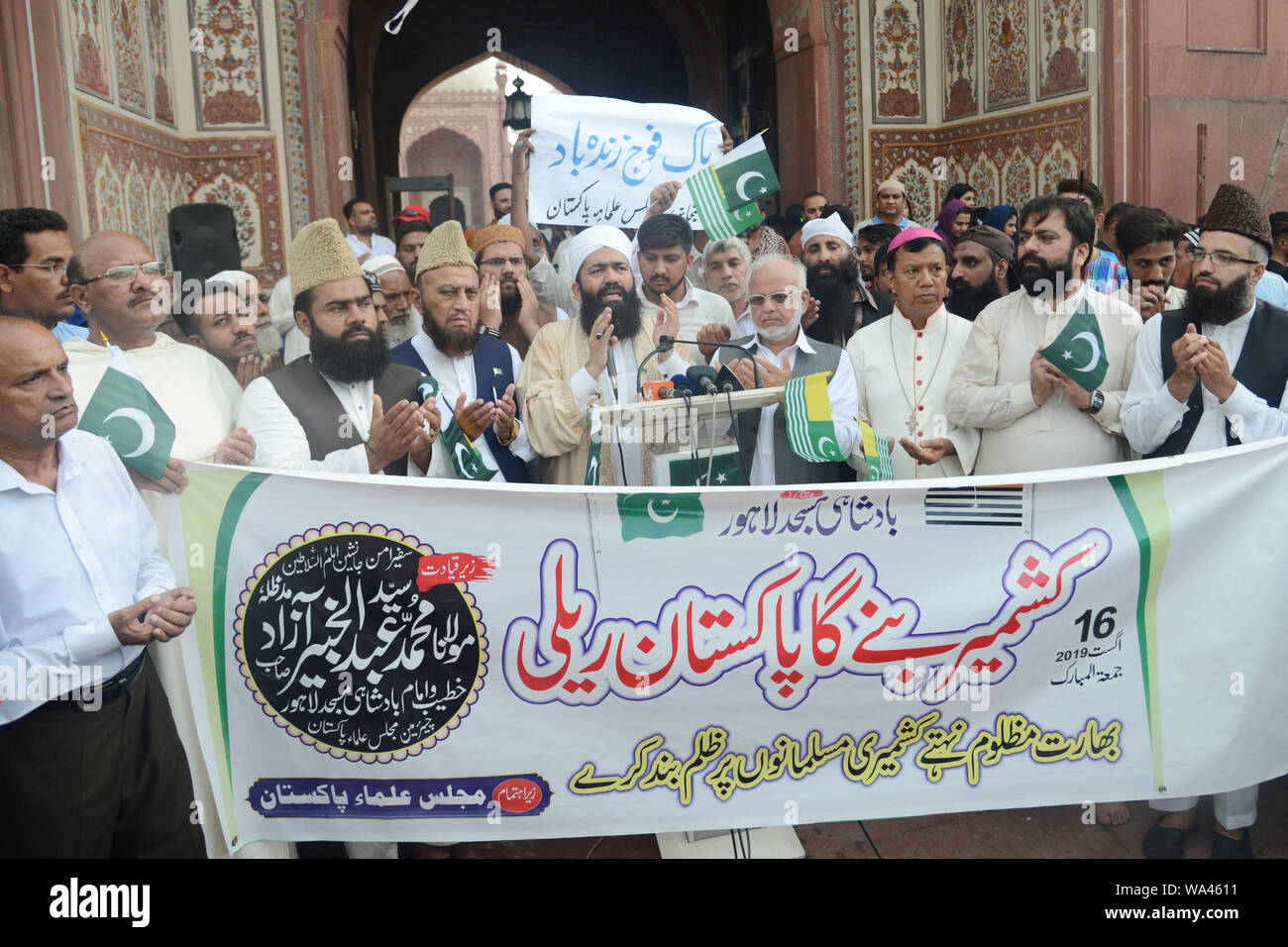 People Holding Pakistan Flag In Rally High Resolution Stock Photography ...