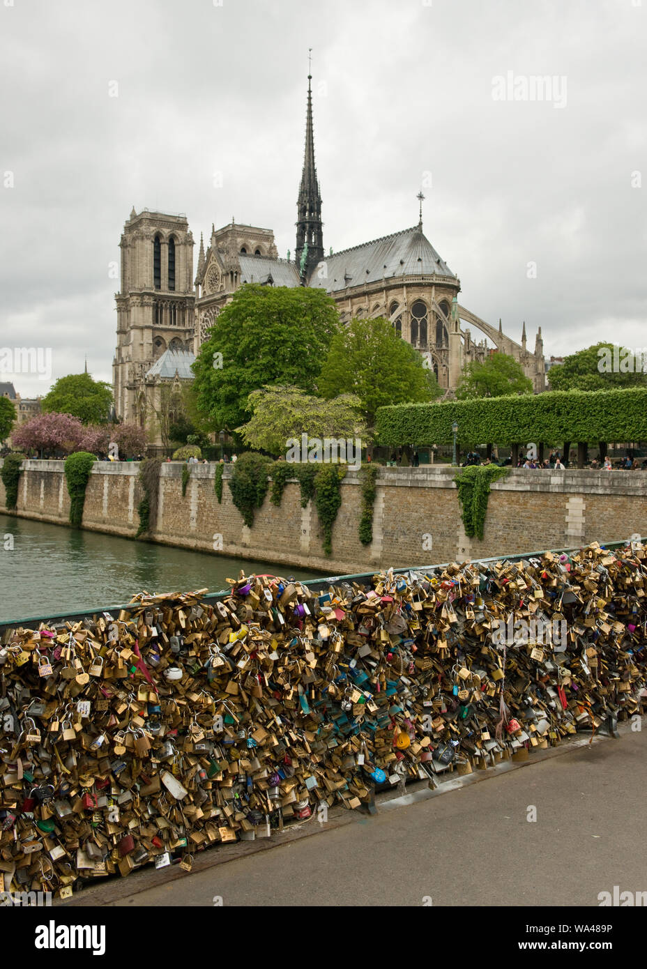 Pont de l'Archeveche bridge with love padlocks and Notre-Dame Cathedral ...