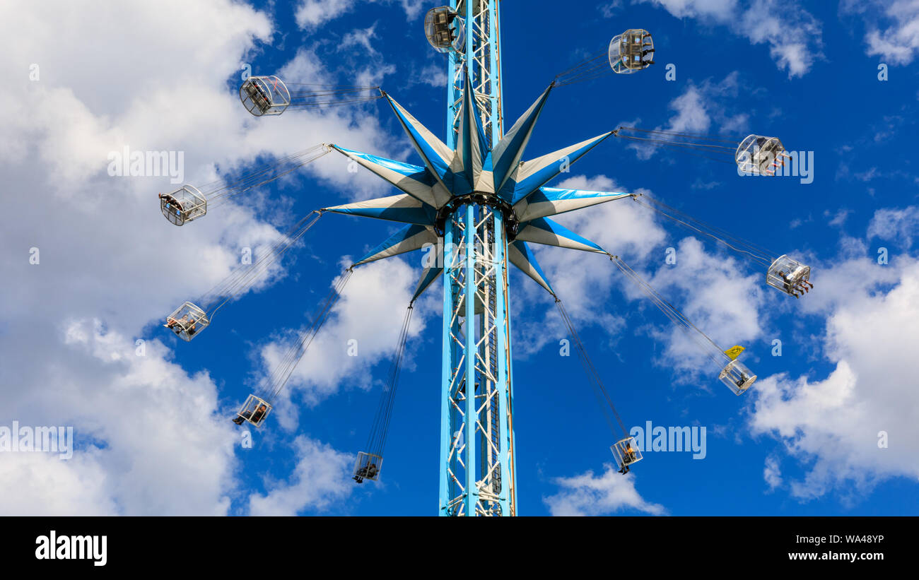 Southbank Starflyer fairground ride, tall funfair attraction, capsules ...