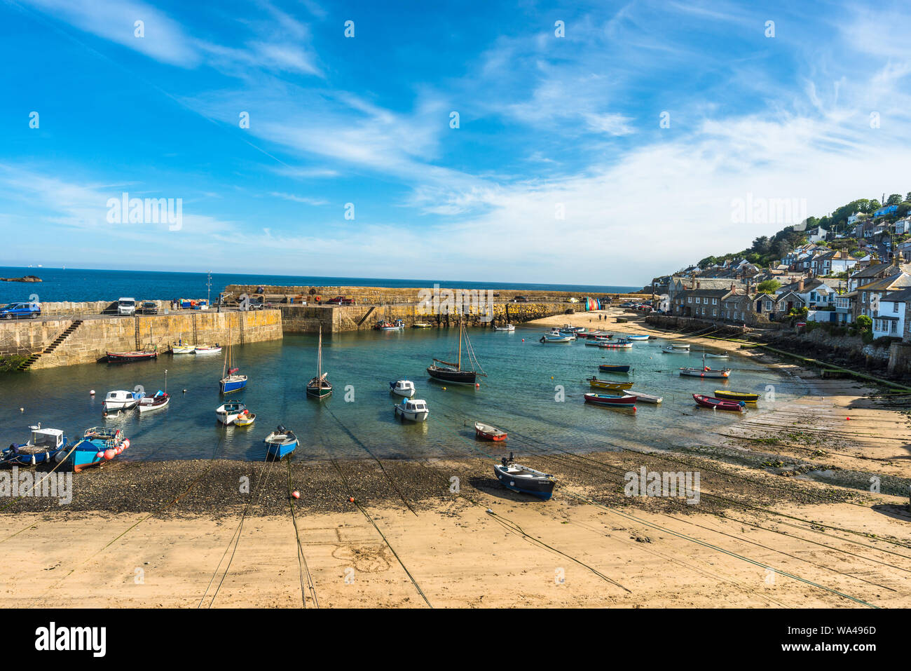 Small fishing boats in Mousehole harbour Cornwall England GB UK EU ...