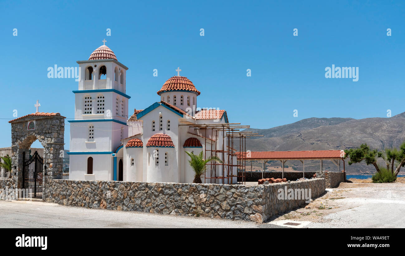 Kissamos, Crete, Greece. June 2019. Greek church having some roof tiles ...