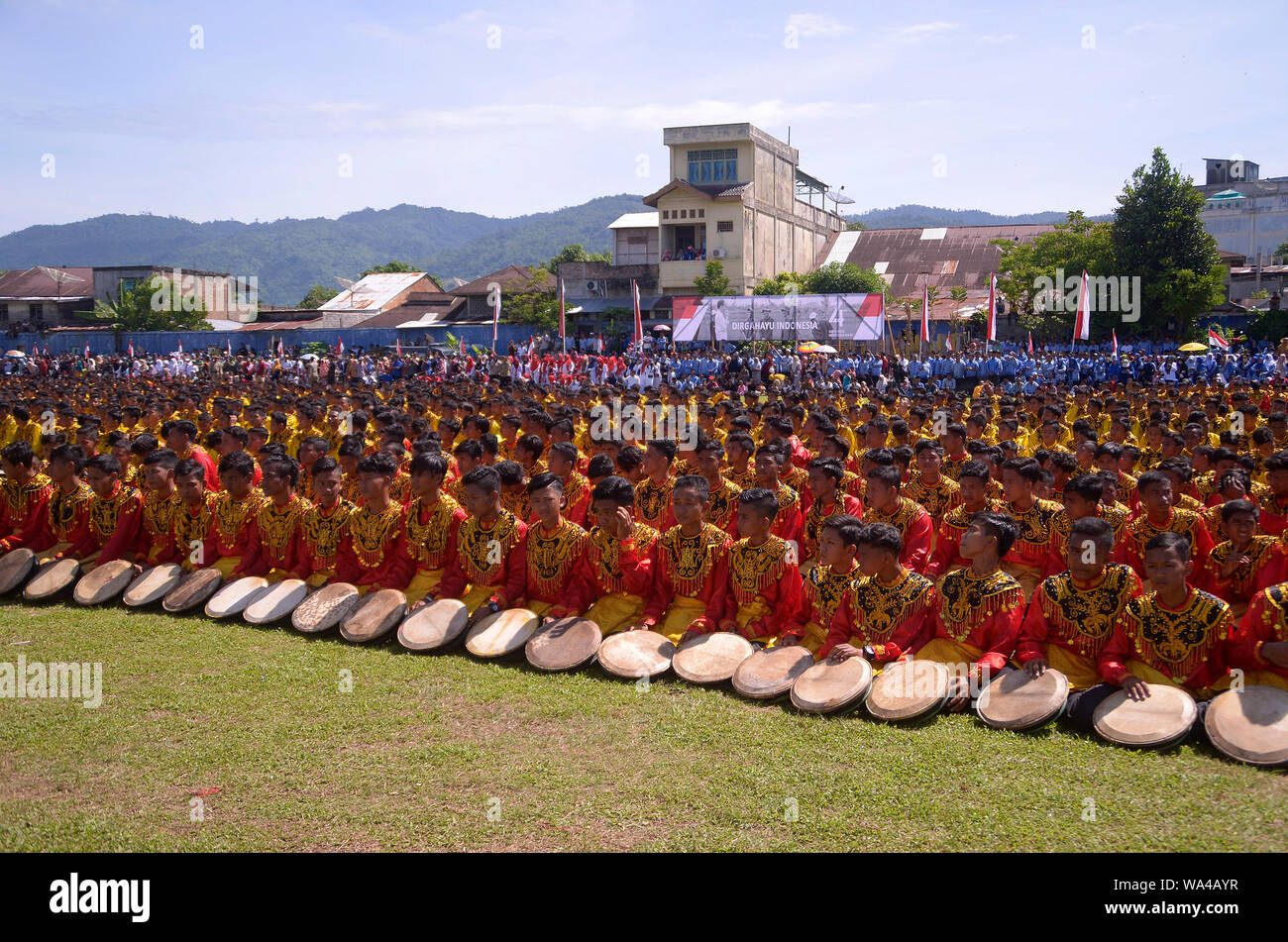 Dancers perform a traditional Acehnese dance at the Persada field in ...