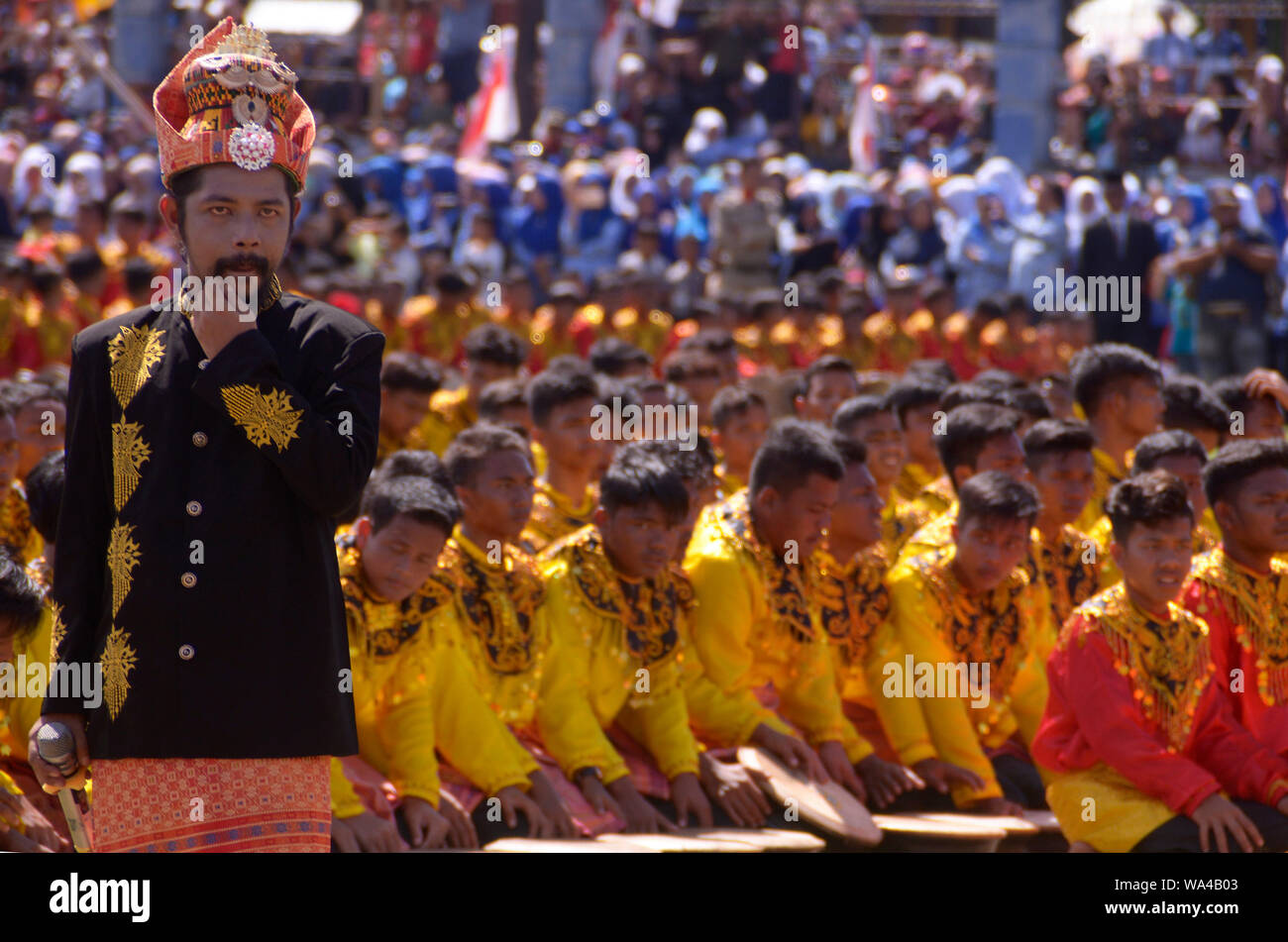 A man dressed in an Aceh traditional cloth at the Persada field during ...