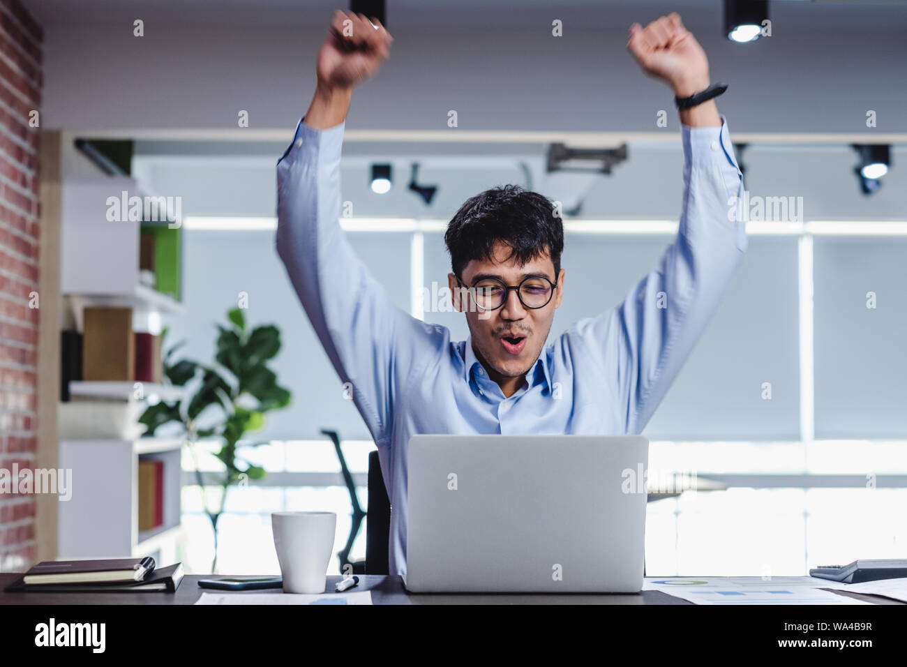 Businessman arms up hi-res stock photography and images - Alamy