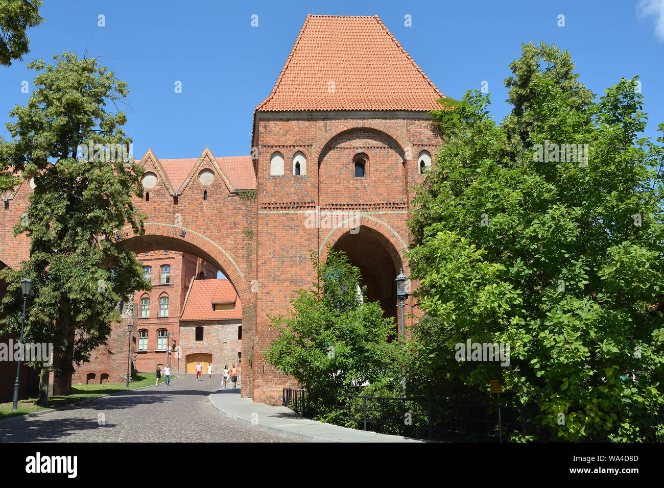 Old city wall of Torun with a defence tower from the 13th century ...